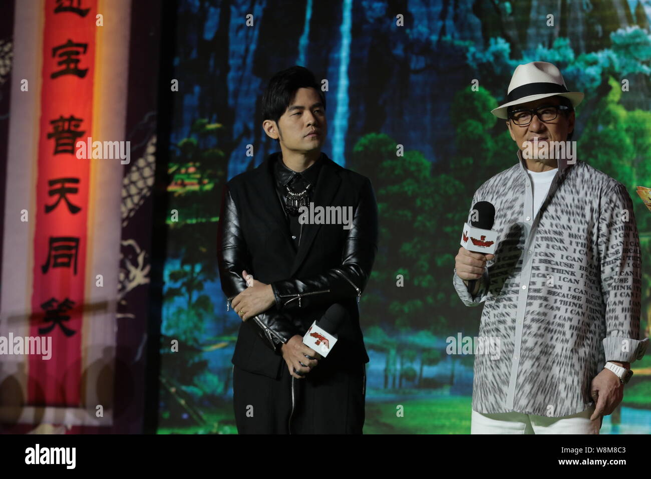 Hong Kong kungfu superstar Jackie Chan, right, Taiwanese singer and ...