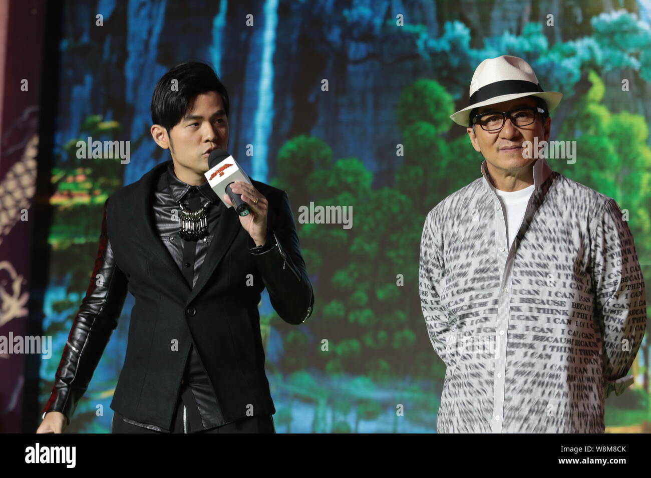 Hong Kong kungfu superstar Jackie Chan, right, Taiwanese singer and ...
