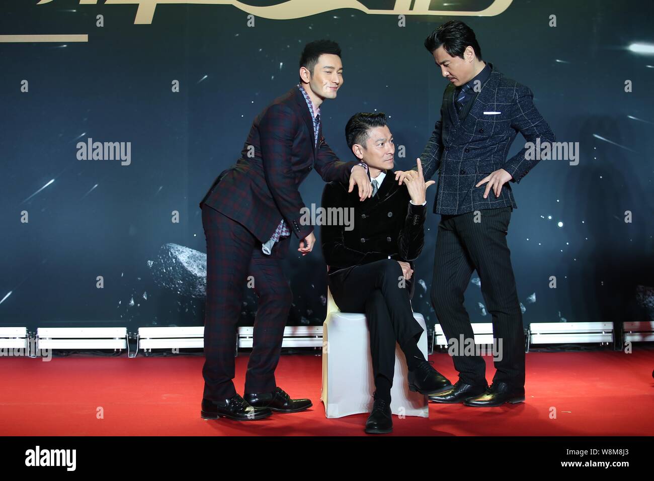 (From left) Chinese actor Huang Xiaoming, Hong Kong actor Andy Lau and ...