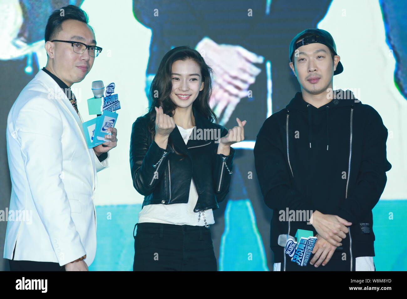 Hong Kong actress Angelababy, center, and South Korean singer and TV ...