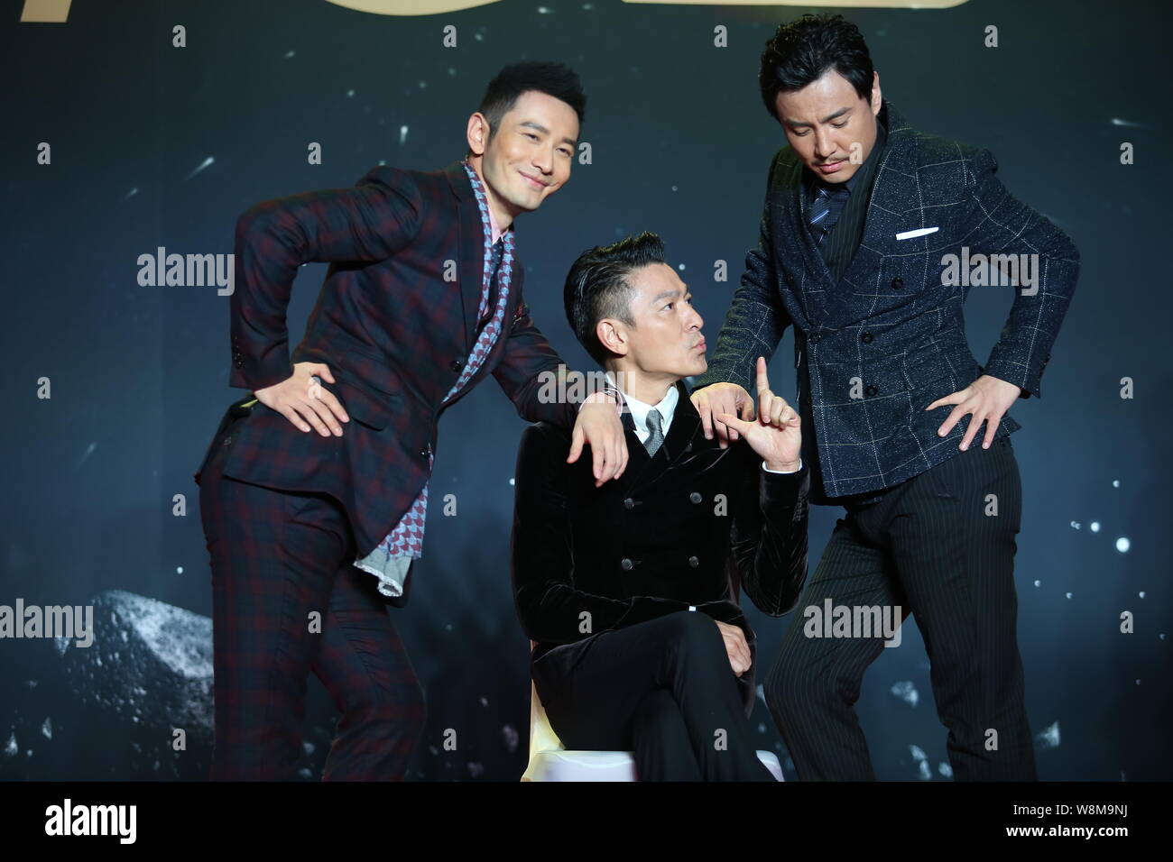 (From left) Chinese actor Huang Xiaoming, Hong Kong actor Andy Lau and ...