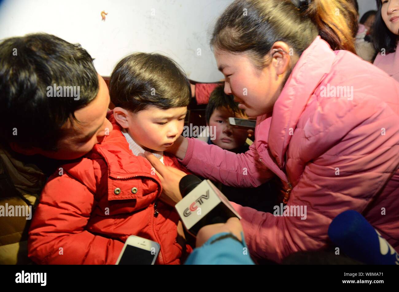 Five-year-old girl Yiran, center, who was kidnapped and later rescued ...