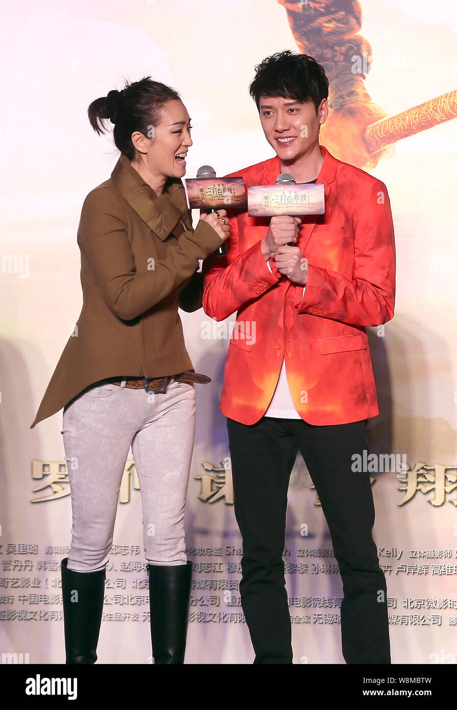 Chinese actress Gong Li, left, actor Feng Shaofeng attend a press ...