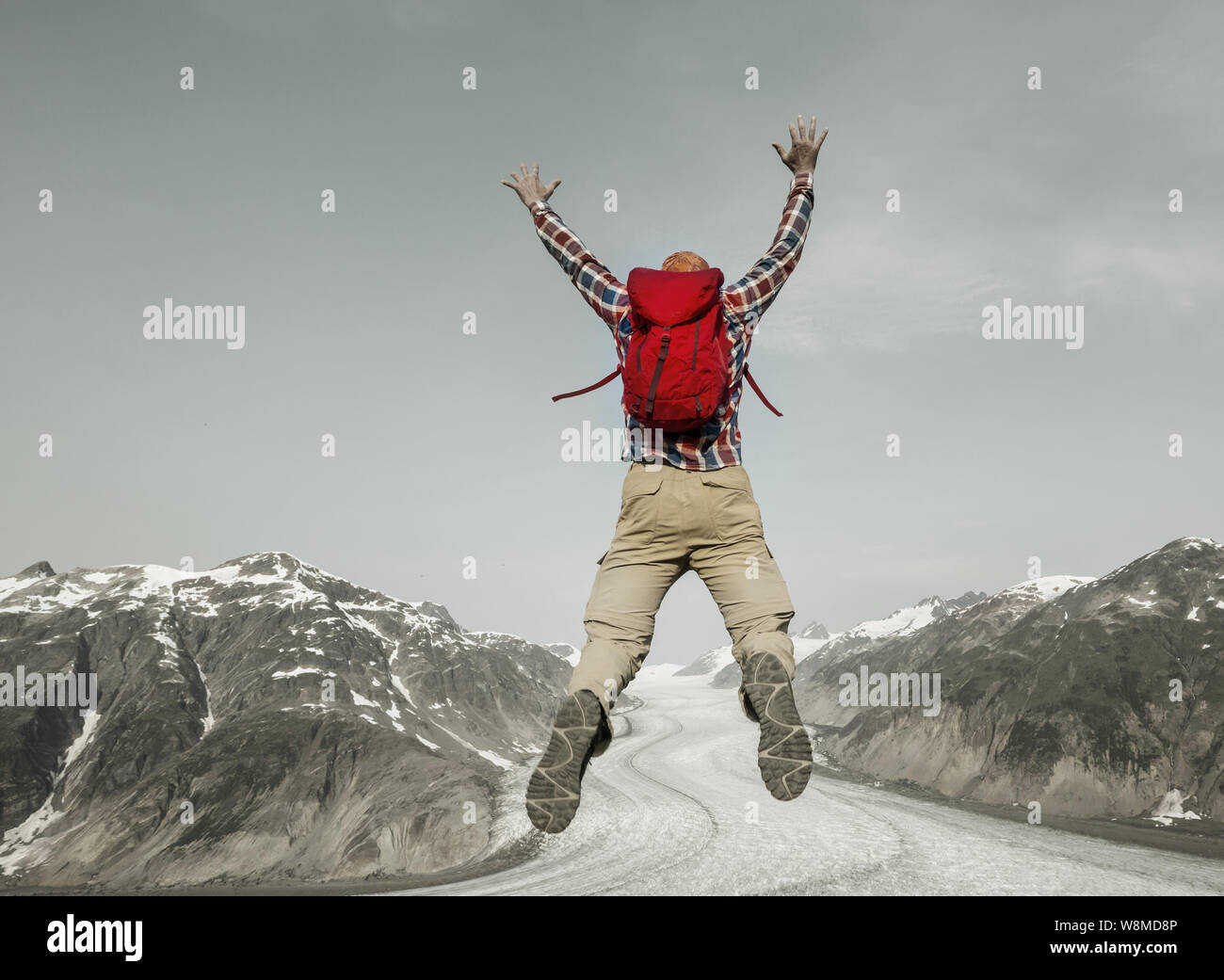Jumping man in volcanic mountains, Bromo, Indonesia Stock Photo - Alamy