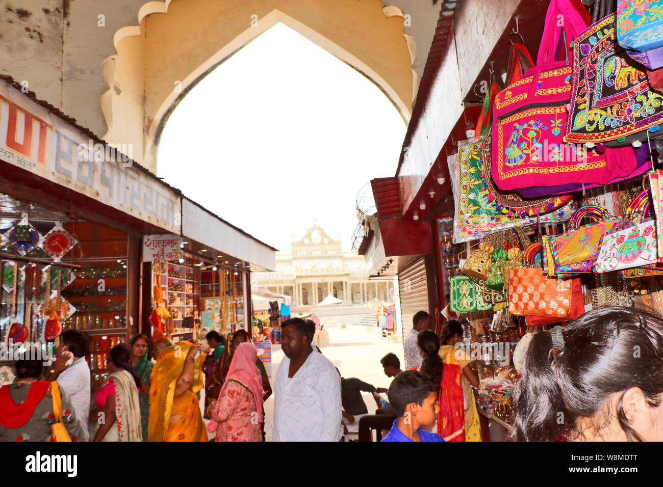 The street market outside a temple in Vrindavan. Pilgrims are buying ...