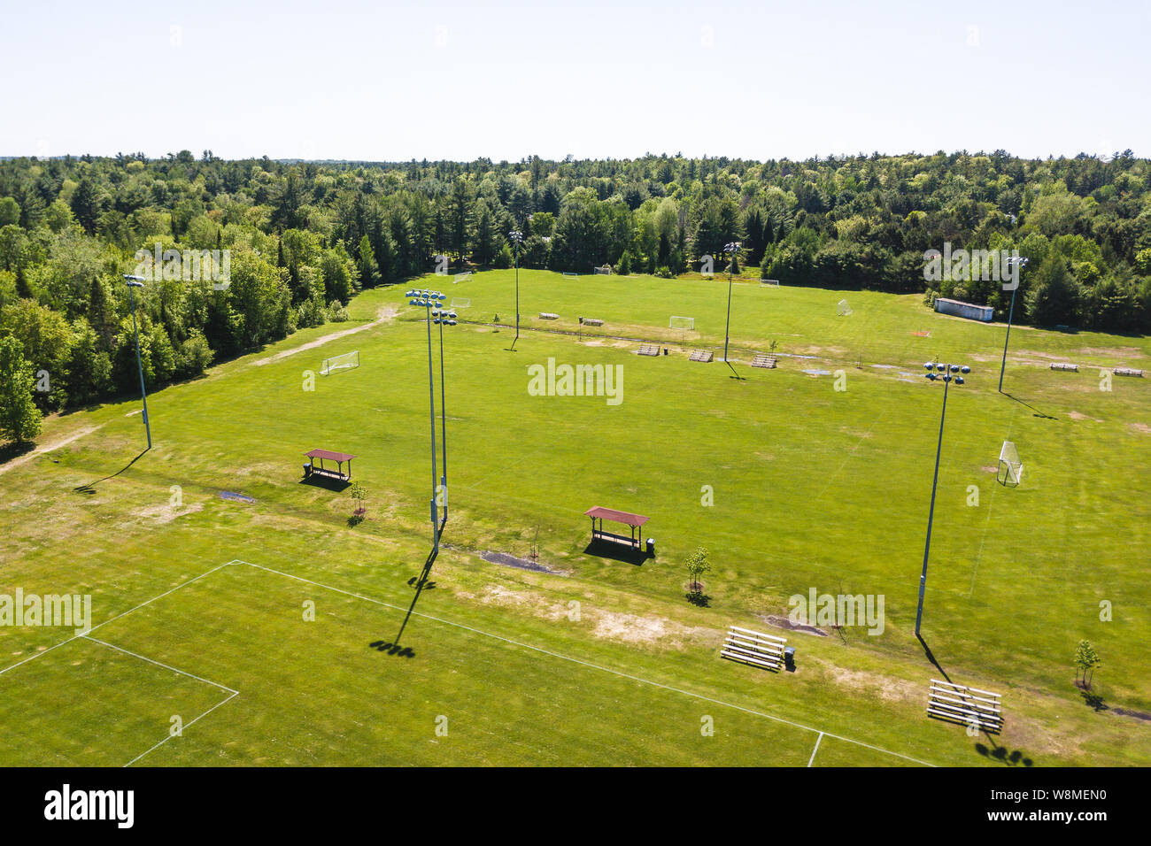 Aerial/Drone view of soccer/football field complex during the afternoon ...