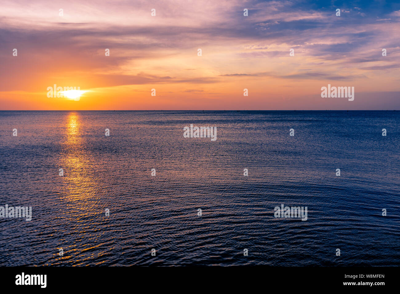 Colorful sunset sky over the ocean with dramatic cloud formation Stock ...