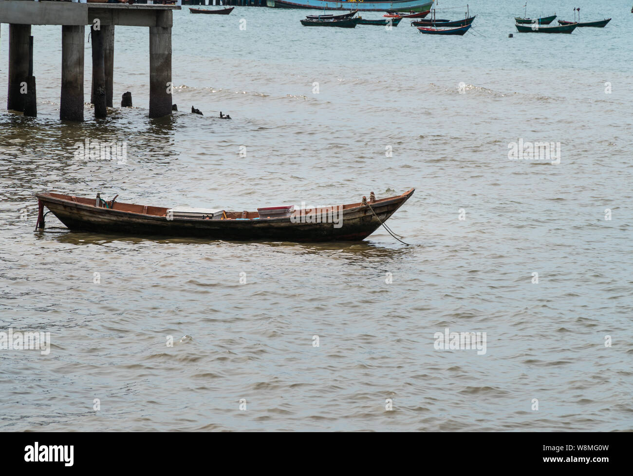 Fishing boats, small boats floating in the sea Stock Photo - Alamy
