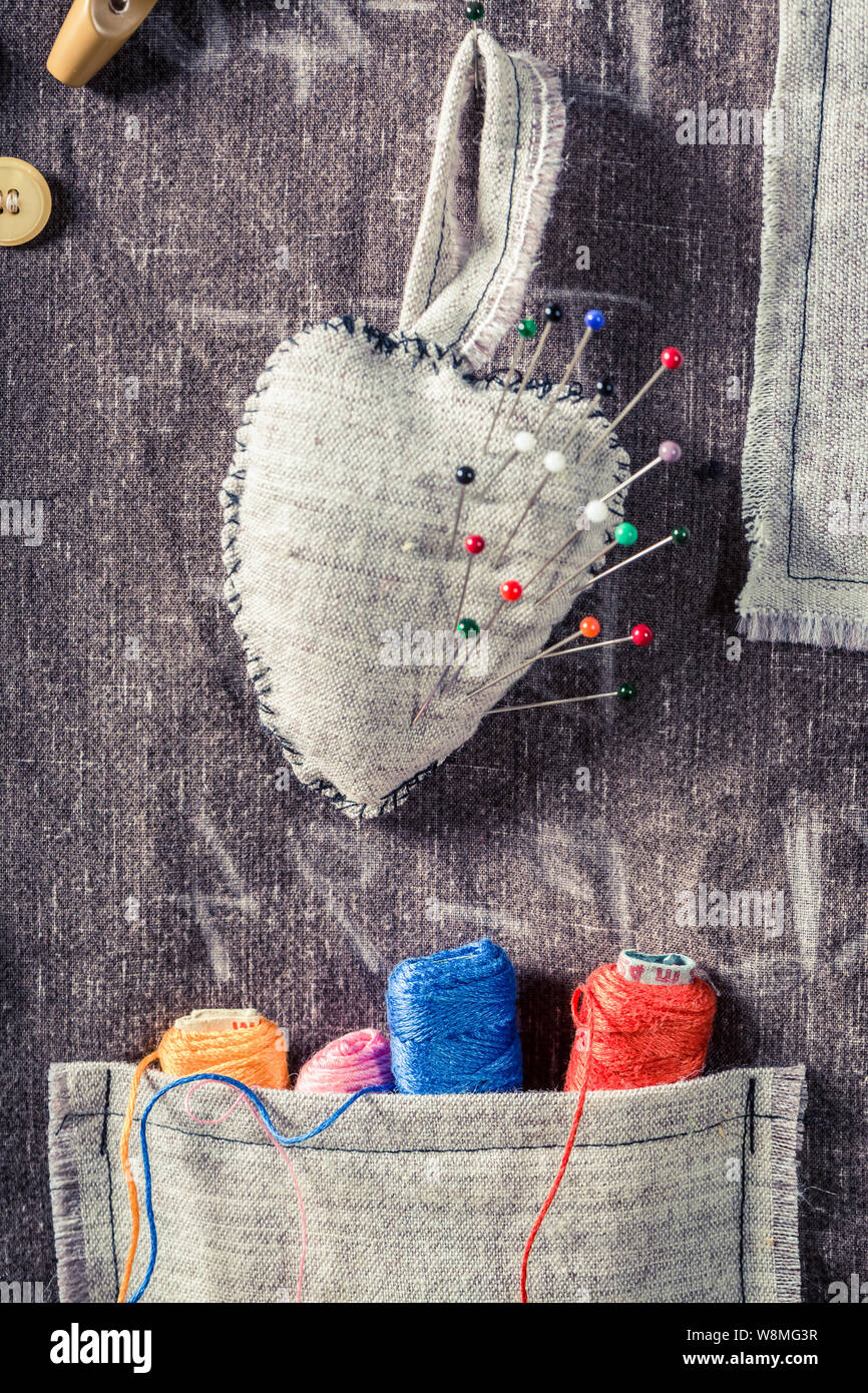 Closeup of threads in the pocket of the mat tailor Stock Photo - Alamy