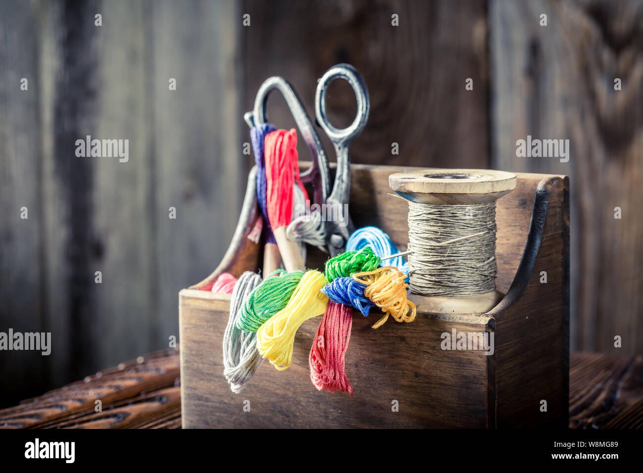 Needle, threads and scissors in tailor wooden box Stock Photo - Alamy