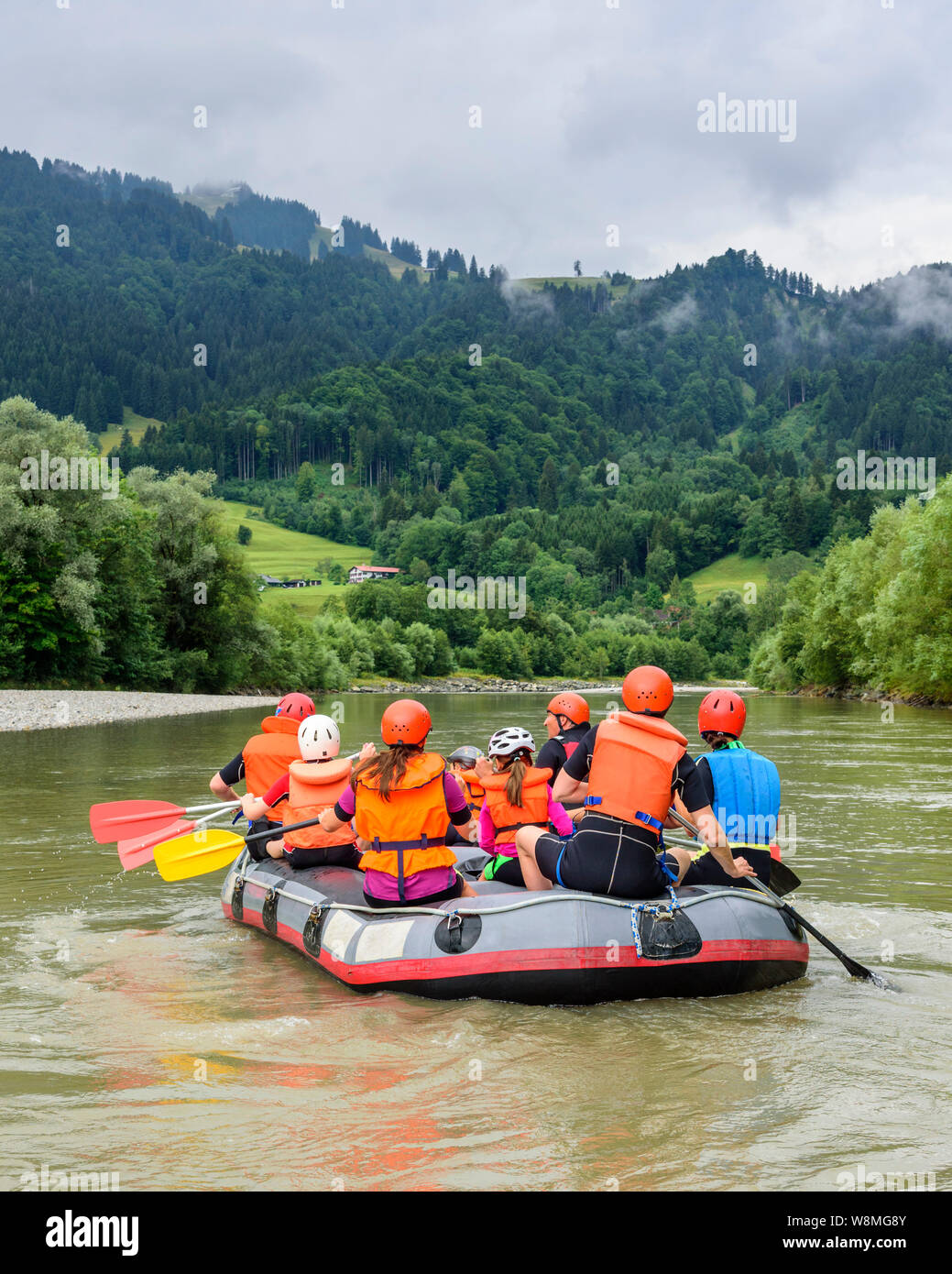 River rafting with families and children on the river Iller in the ...