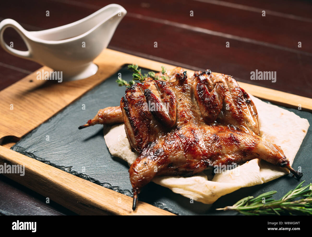Three marinated grilled chicken hi-res stock photography and images - Alamy