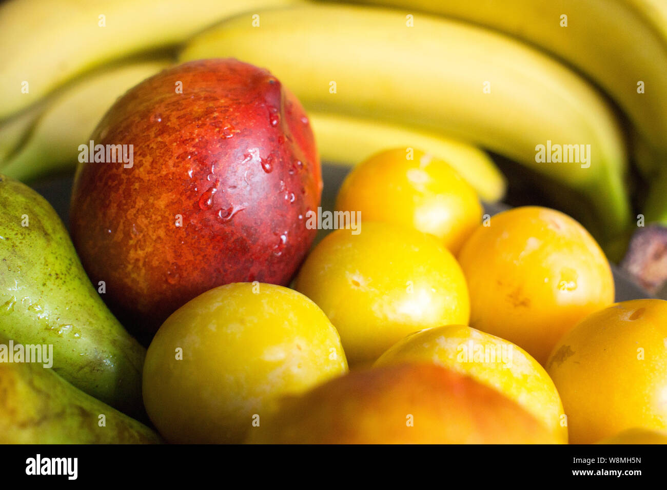 Exotic fruits variety still life on ceramic plate Stock Photo - Alamy