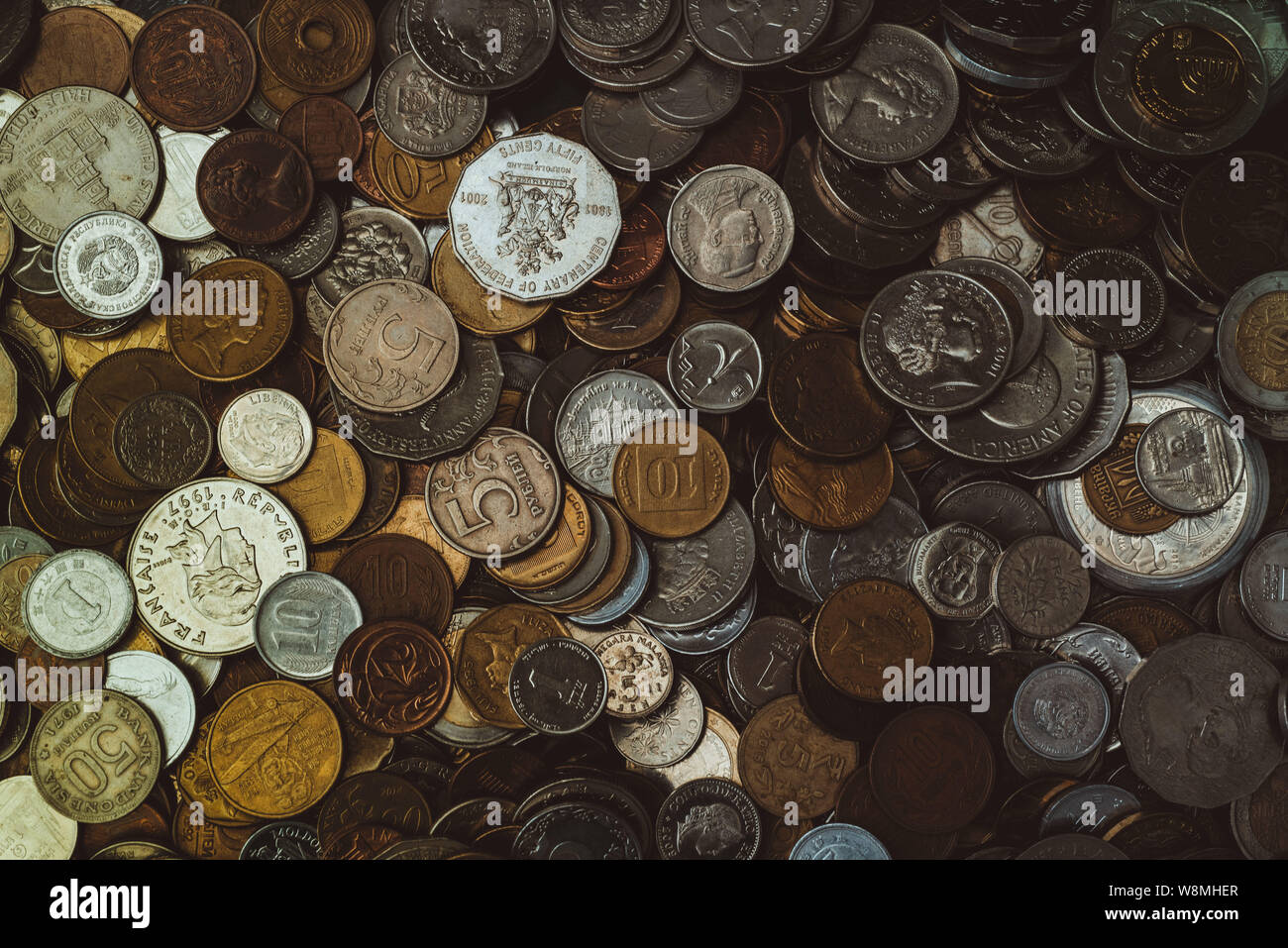 Coins in colour, international collection. Coin background Stock Photo ...
