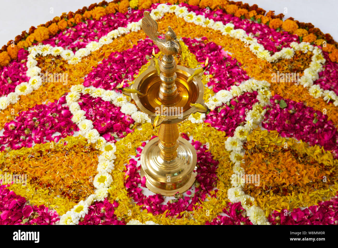 Colorful rangoli on the floor, India Stock Photo - Alamy