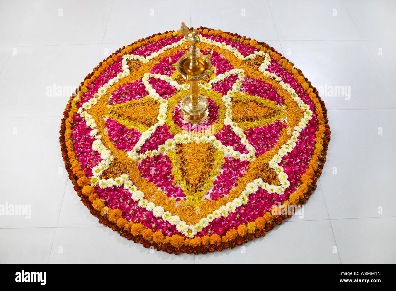 Colorful rangoli on the floor, India Stock Photo - Alamy