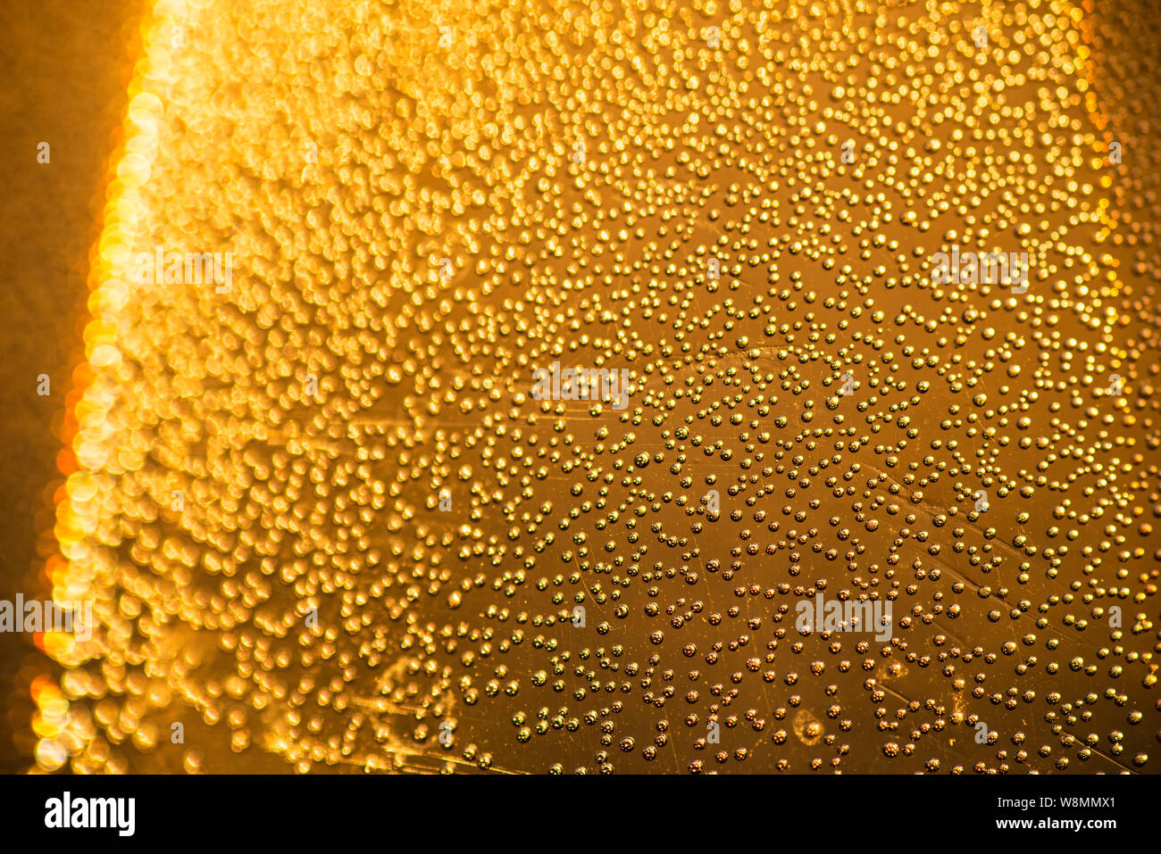 Oxygen bubbles in the bottle with water or drink. Selective focus with ...
