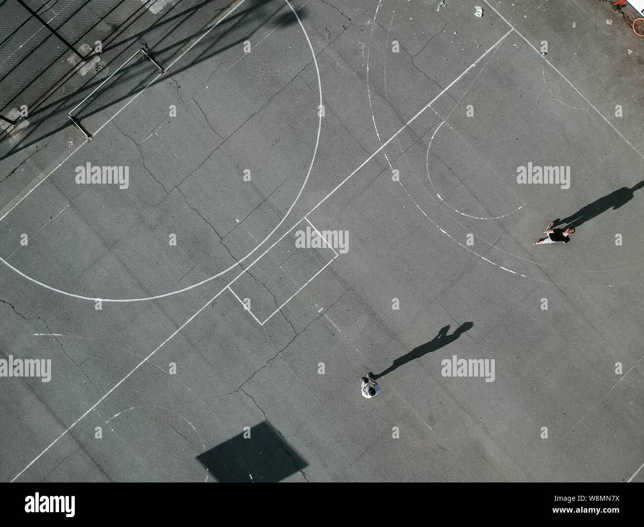 Overhead shot of people playing basketball outdoors Stock Photo - Alamy