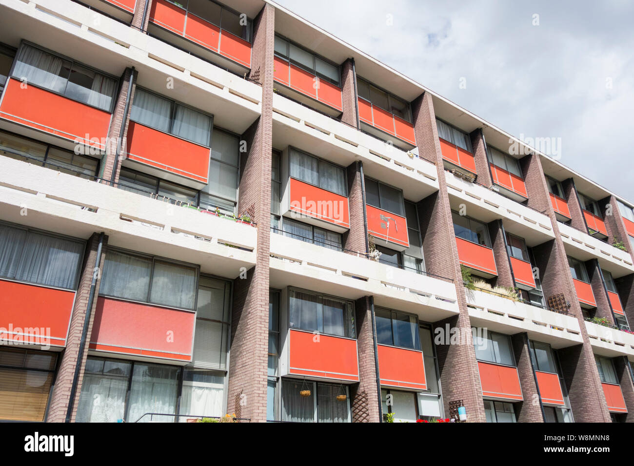 Exterior of Basterfield House apartments on Golden Lane Estate, London ...