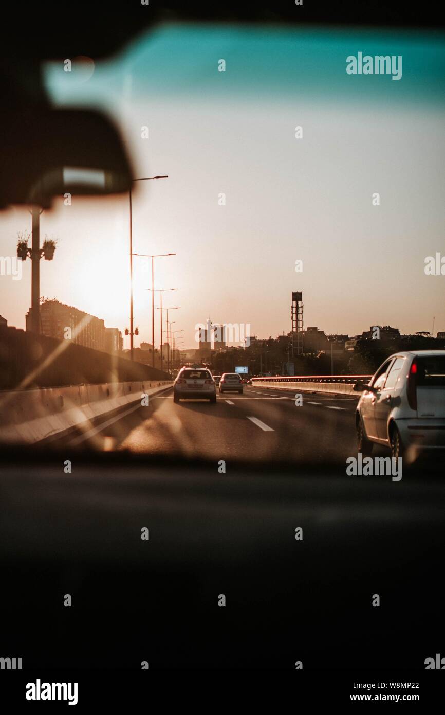 Vertical shot of vehicles on the highway shot from inside of a car ...