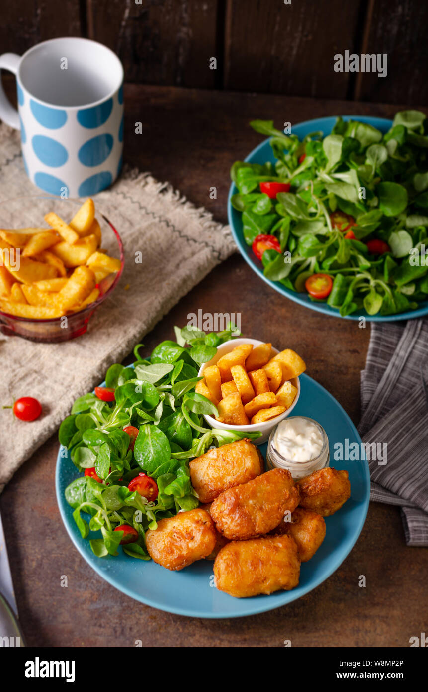 Fish and homemade french fries with delicious tartar sauce Stock Photo ...
