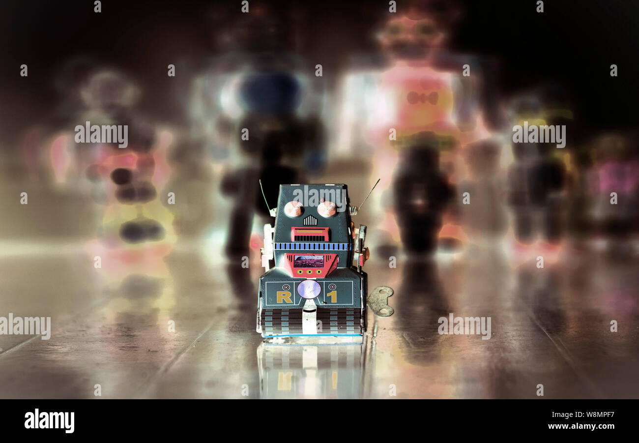 little robot toy on old wooden floor abstract solarized color Stock ...