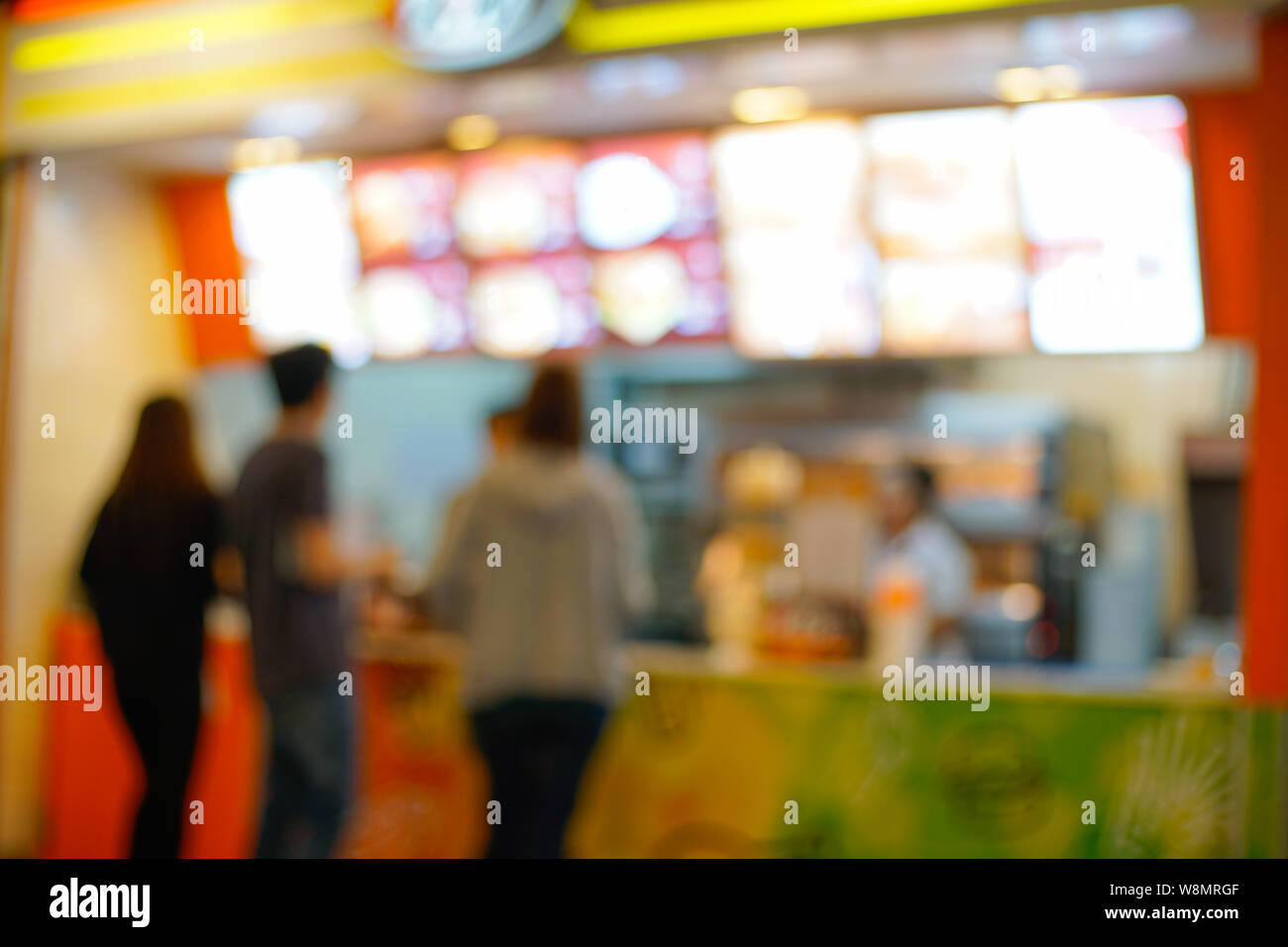Blurred people order fast food for background Stock Photo - Alamy