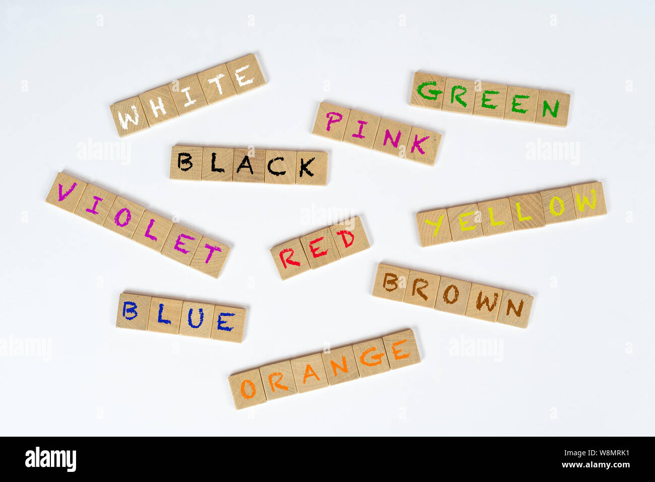 the colors written on colored wooden tiles Stock Photo - Alamy
