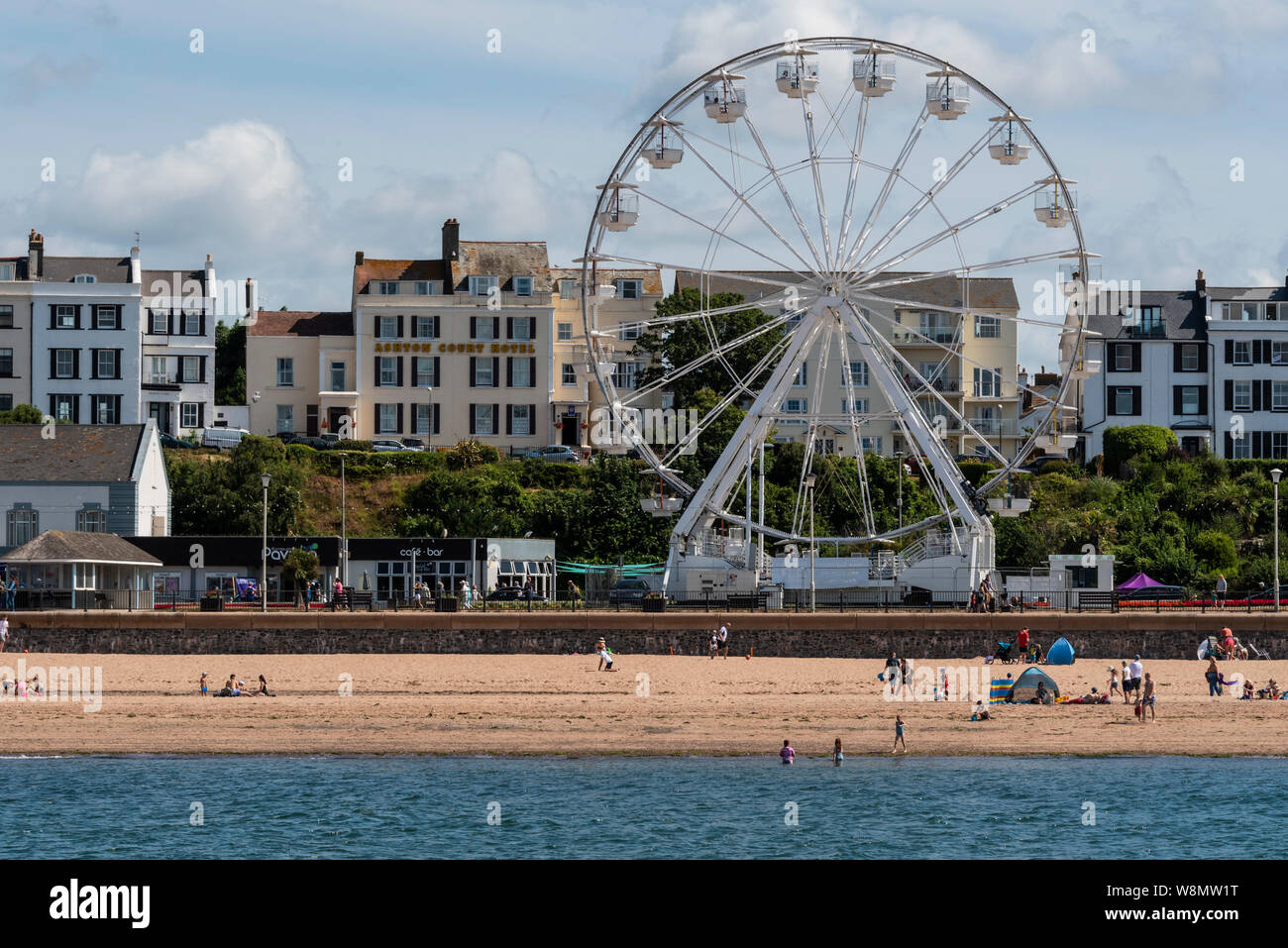 Ferris wheel on Exemouth sea front viewed from river Exe Stock Photo ...