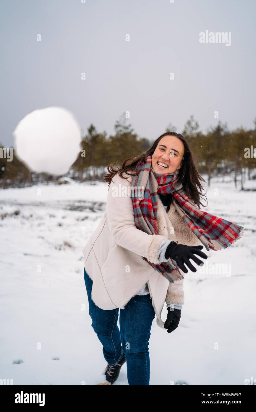 Girl catching snow in hands hi-res stock photography and images - Alamy