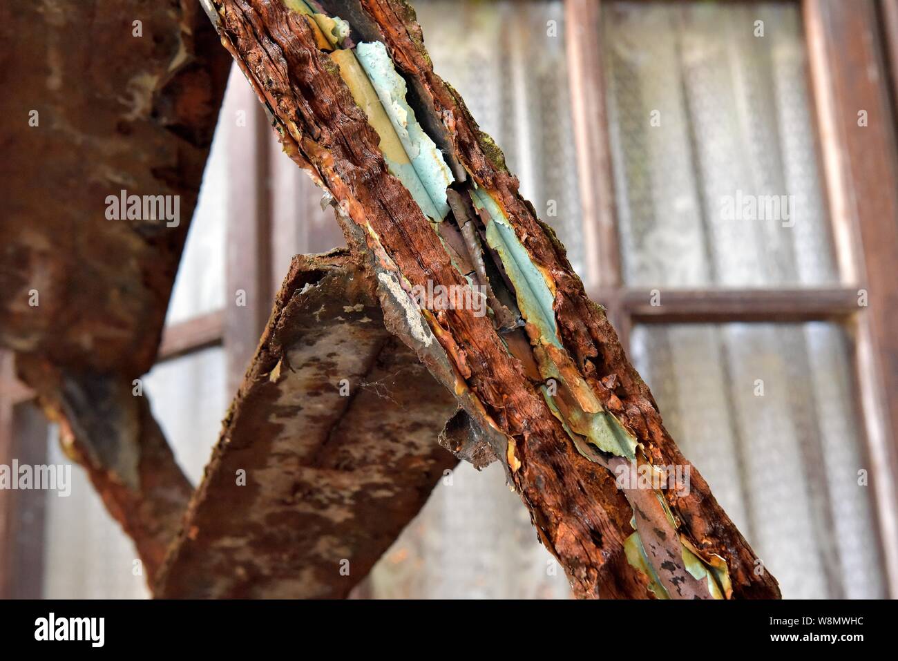 Detail of the rusting on the stair string Stock Photo - Alamy