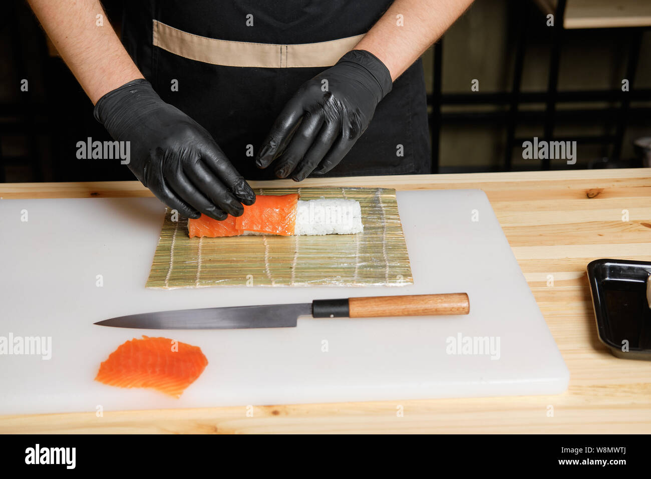 Male hand put salmon hi-res stock photography and images - Alamy