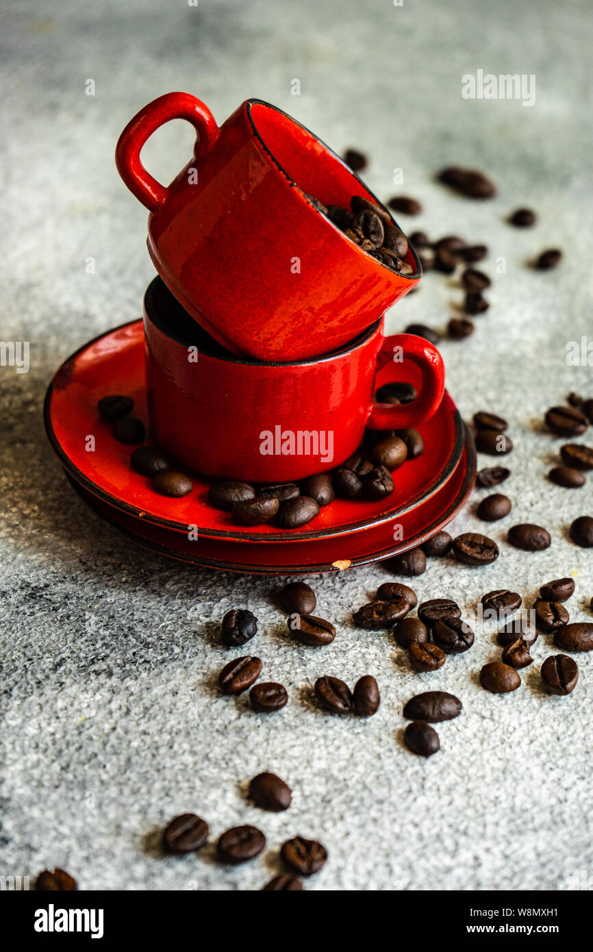 Ceramic cup and coffee beans on stone background with copy space as a ...