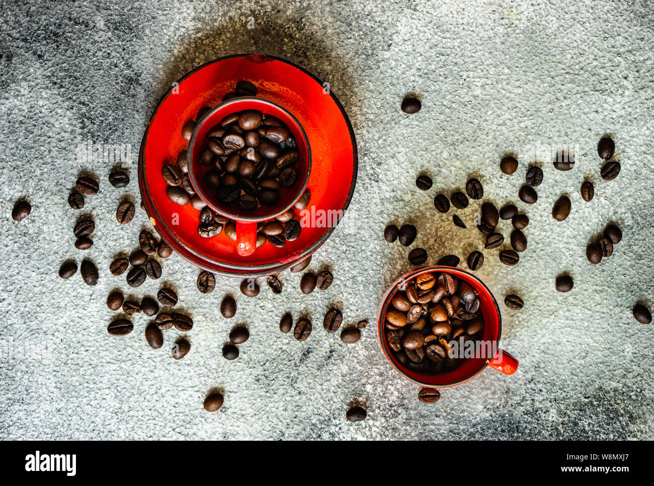 Ceramic cup and coffee beans on stone background with copy space as a ...