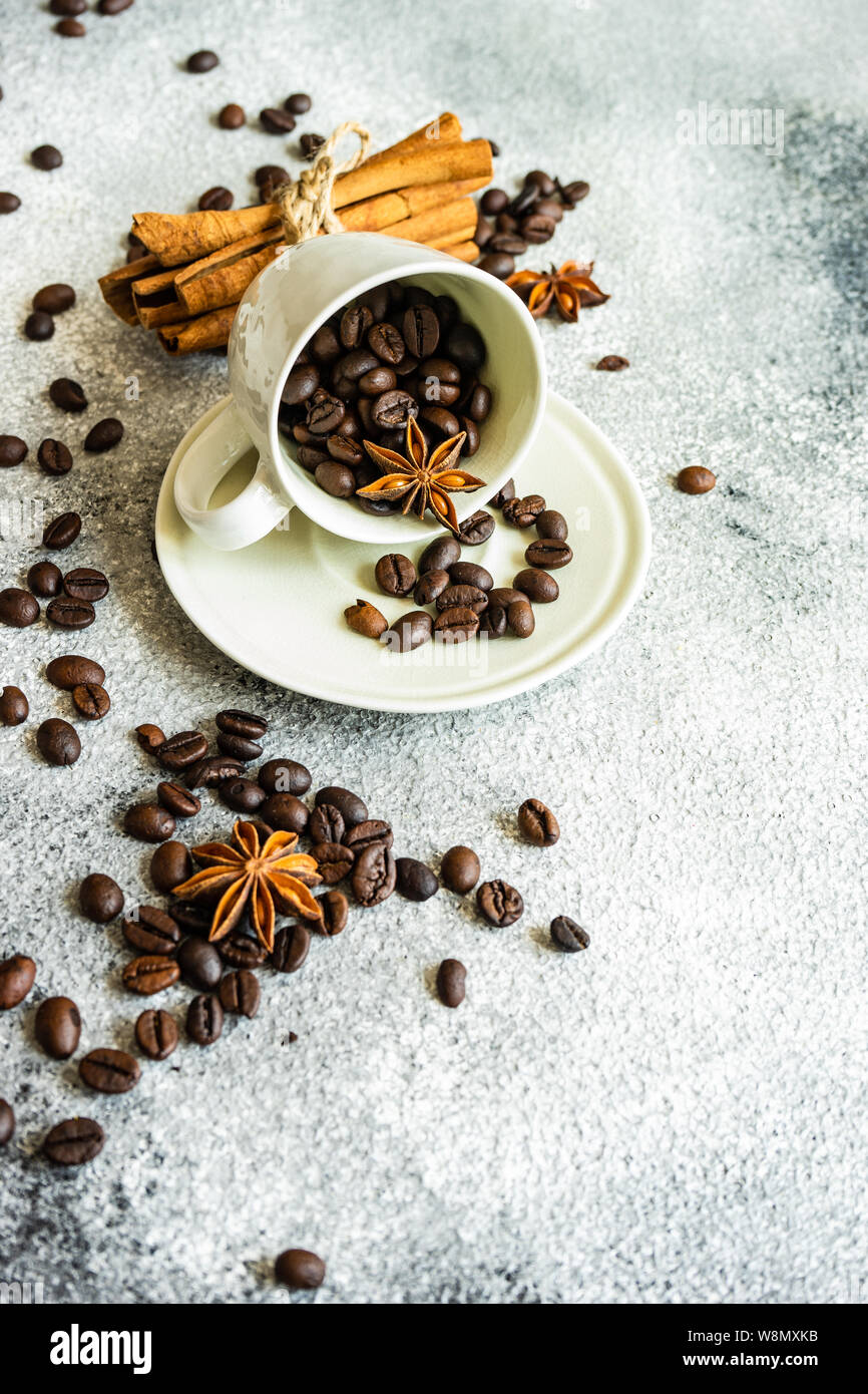 Ceramic cup and coffee beans on stone background with copy space as a ...