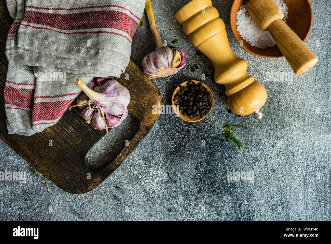 Cooking concept with spices on rusty stone background with copy space ...