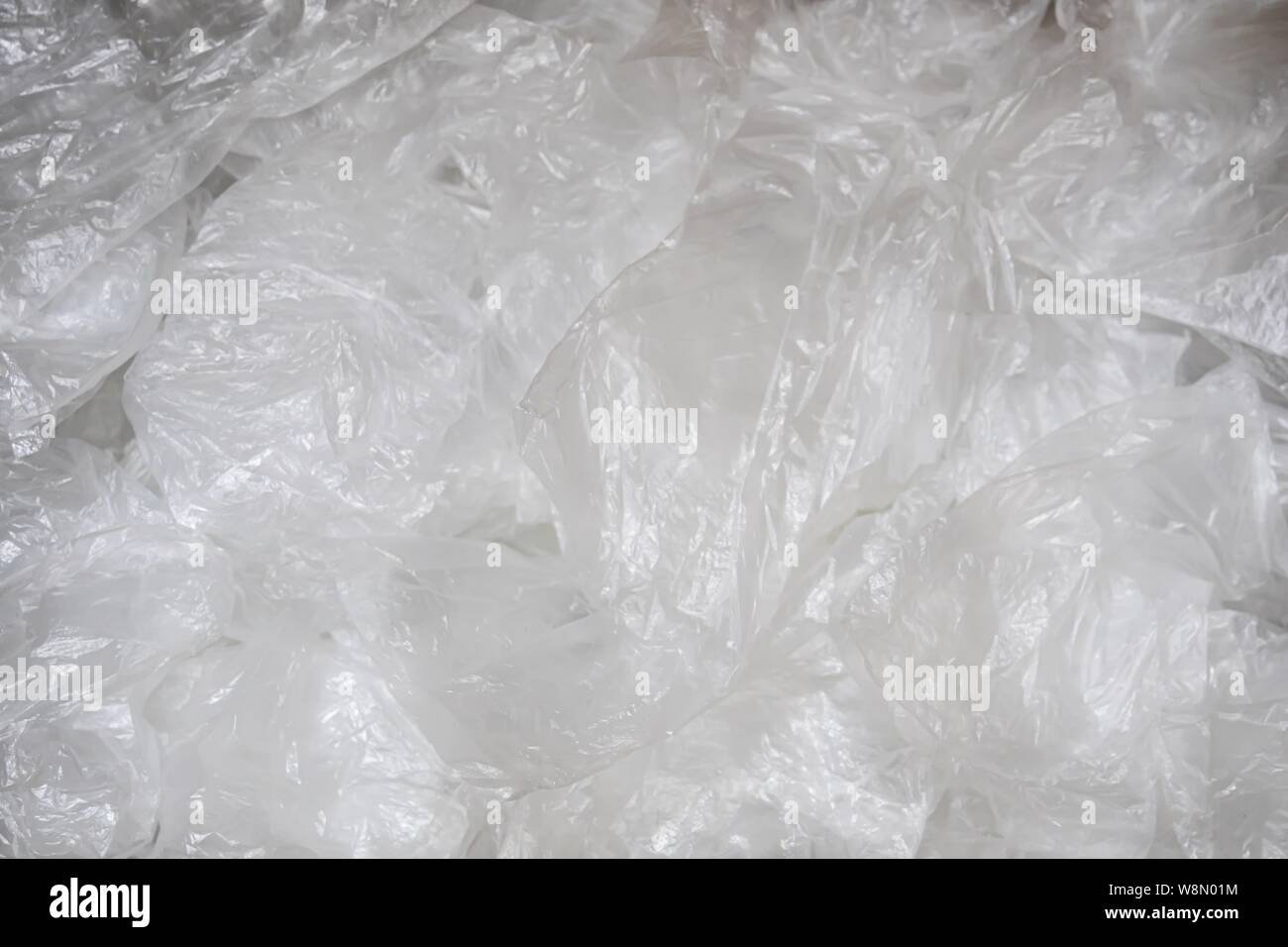 used plastic bag in paper box for recycling Stock Photo - Alamy
