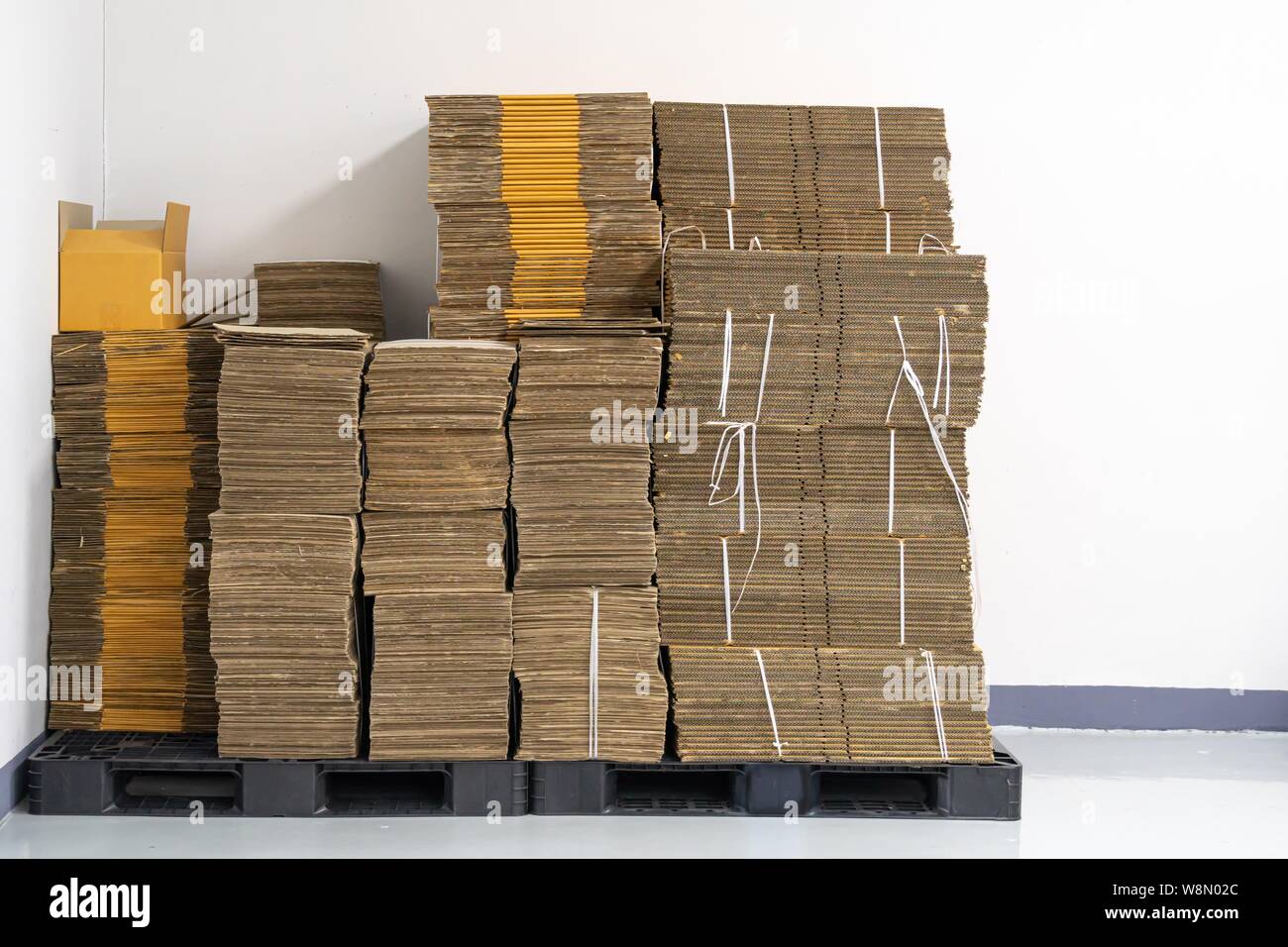 stack of flat pack cardboard boxes for product packaging and delivery ...