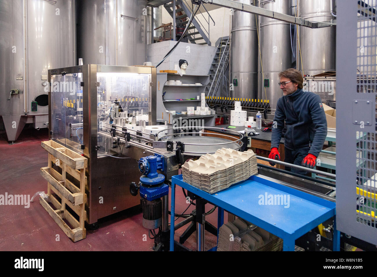Wine factory, production room, warehouse, shelving, shelves with boxes ...