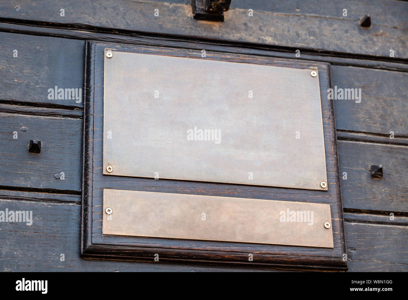 Old bronze name plate hi-res stock photography and images - Alamy