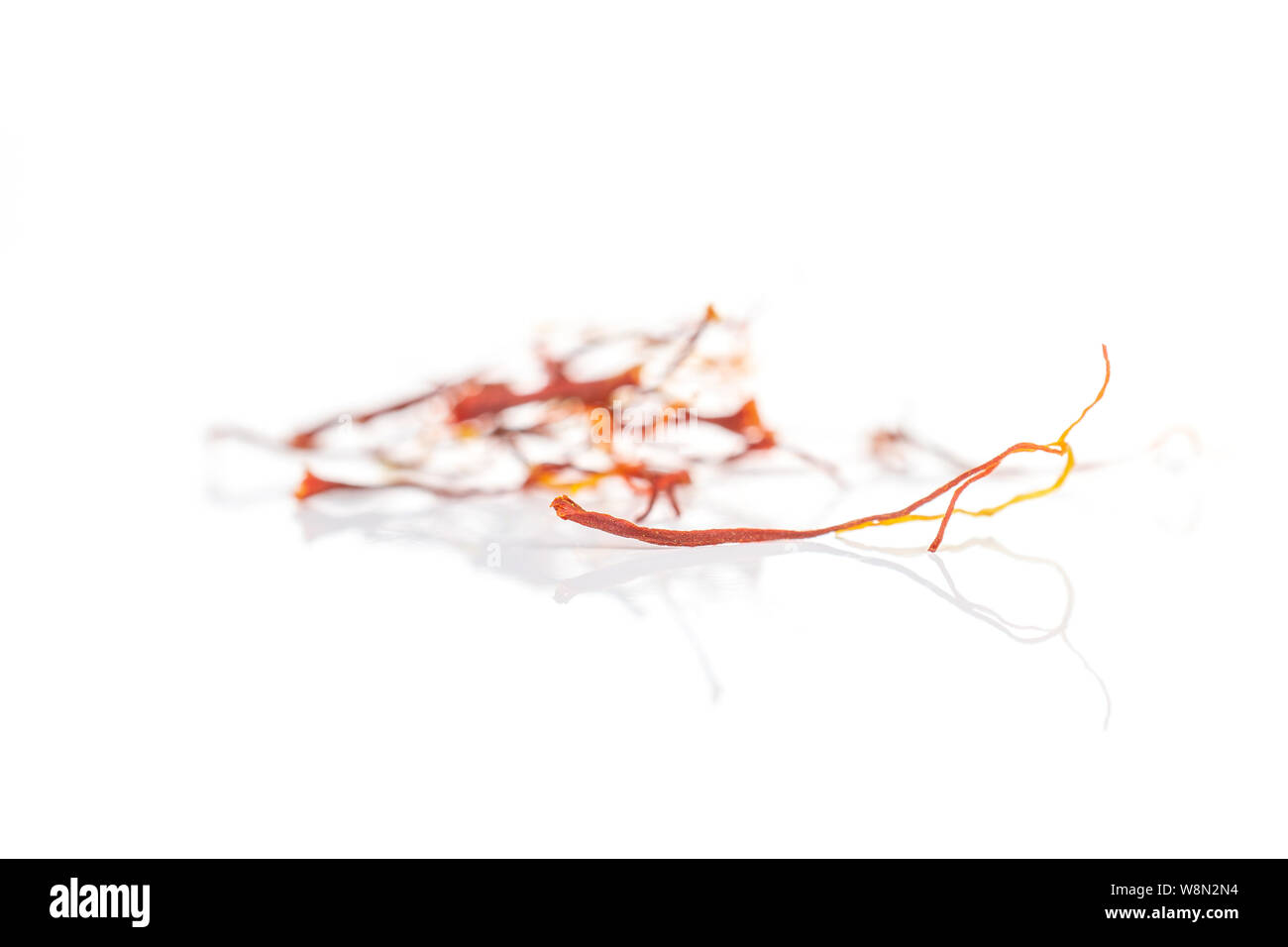 Lot of whole dry shaffron thread isolated on white background Stock ...