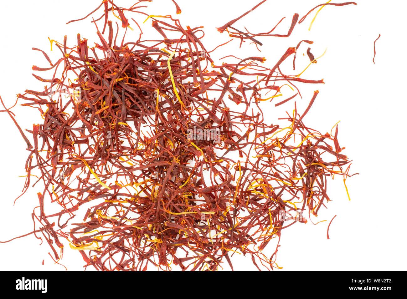 Lot of whole bright dry shaffron thread flatlay on white background ...