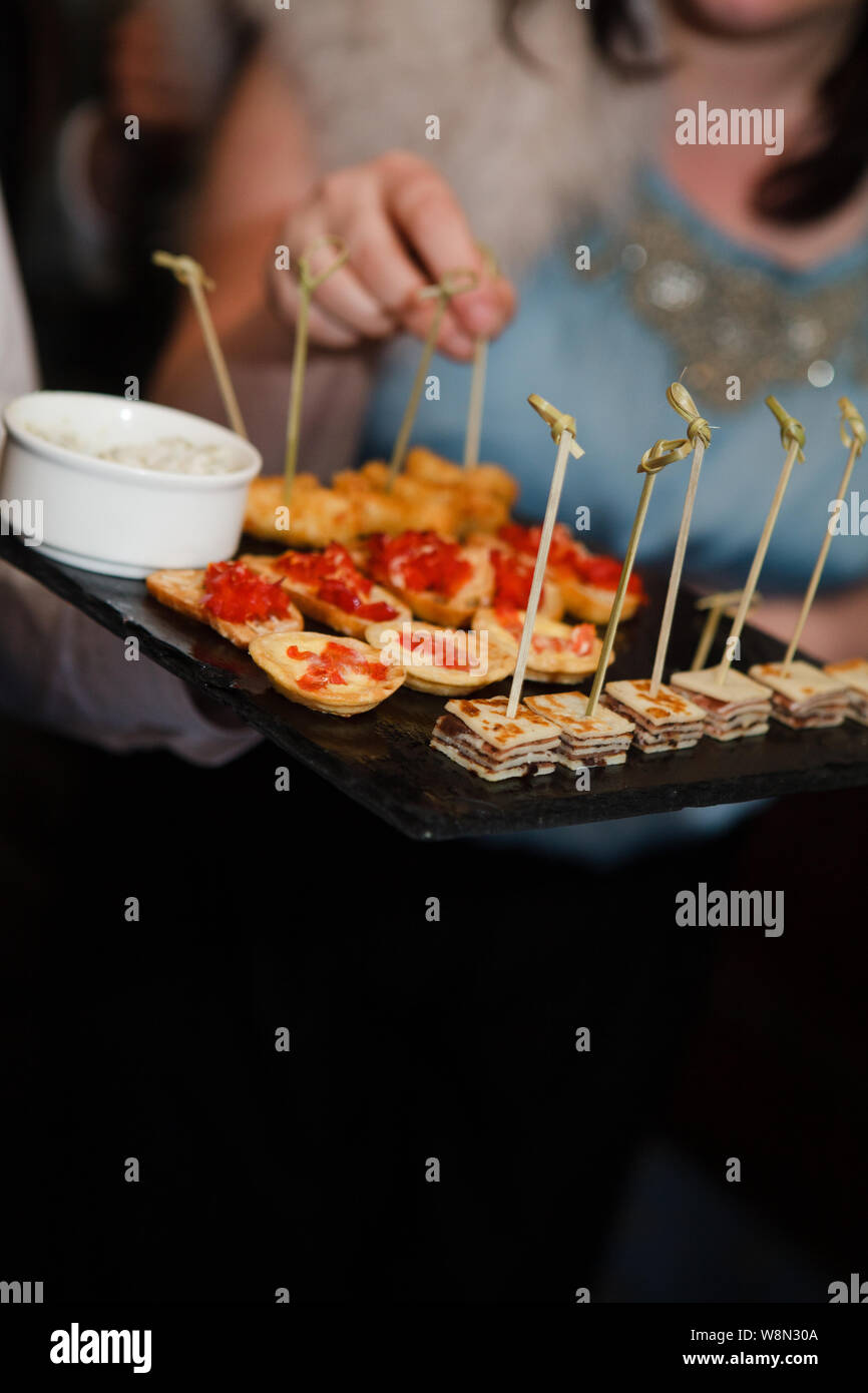 Waitress serving canapes hi-res stock photography and images - Alamy