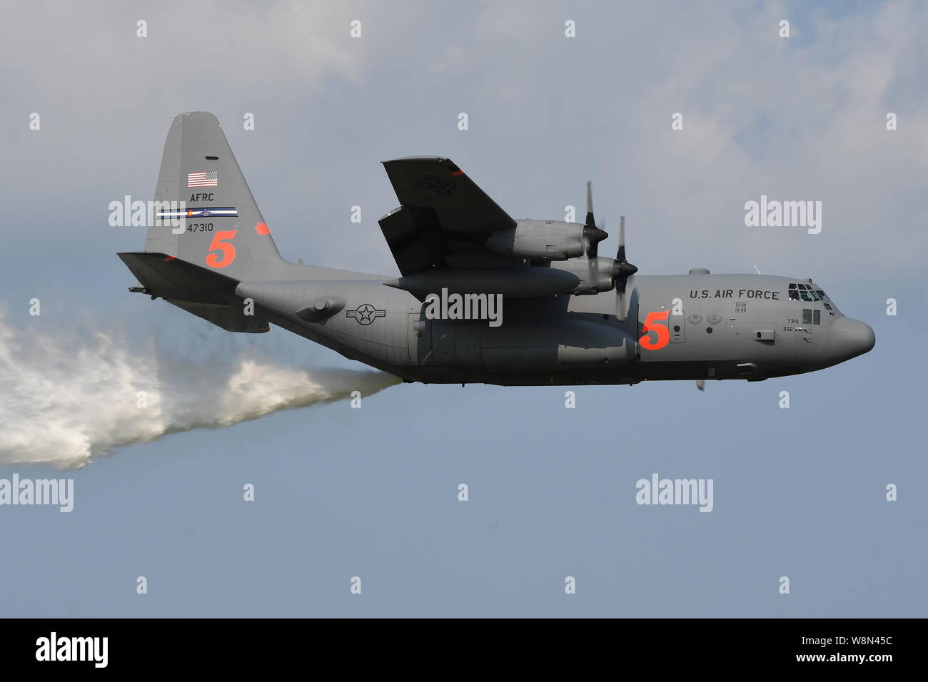 FIREFIGHTING - U.S. AIR FORCE C-130H HERCULES WATER DROP Stock Photo ...