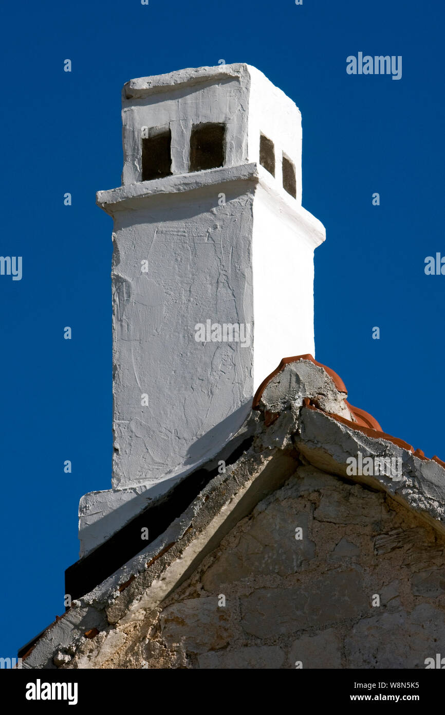 Typical white painted chimney hi-res stock photography and images - Alamy