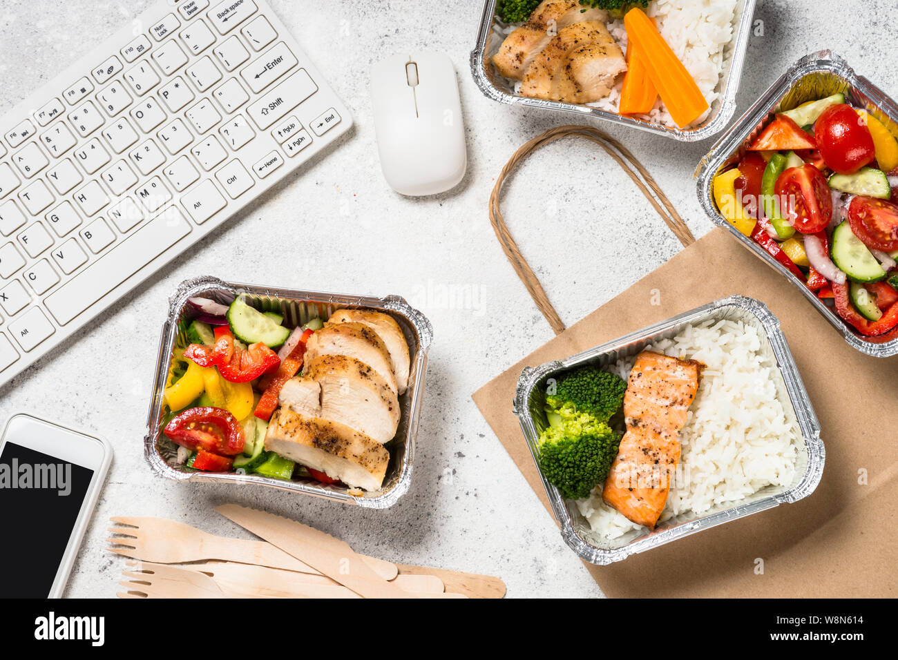 Food delivery concept - healthy lunch in boxes in the office Stock ...