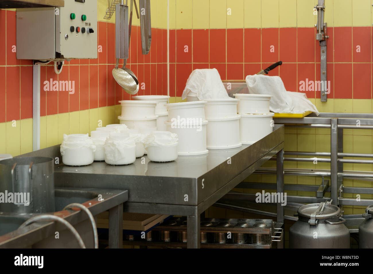 Cheese making room on food processing plant Stock Photo - Alamy