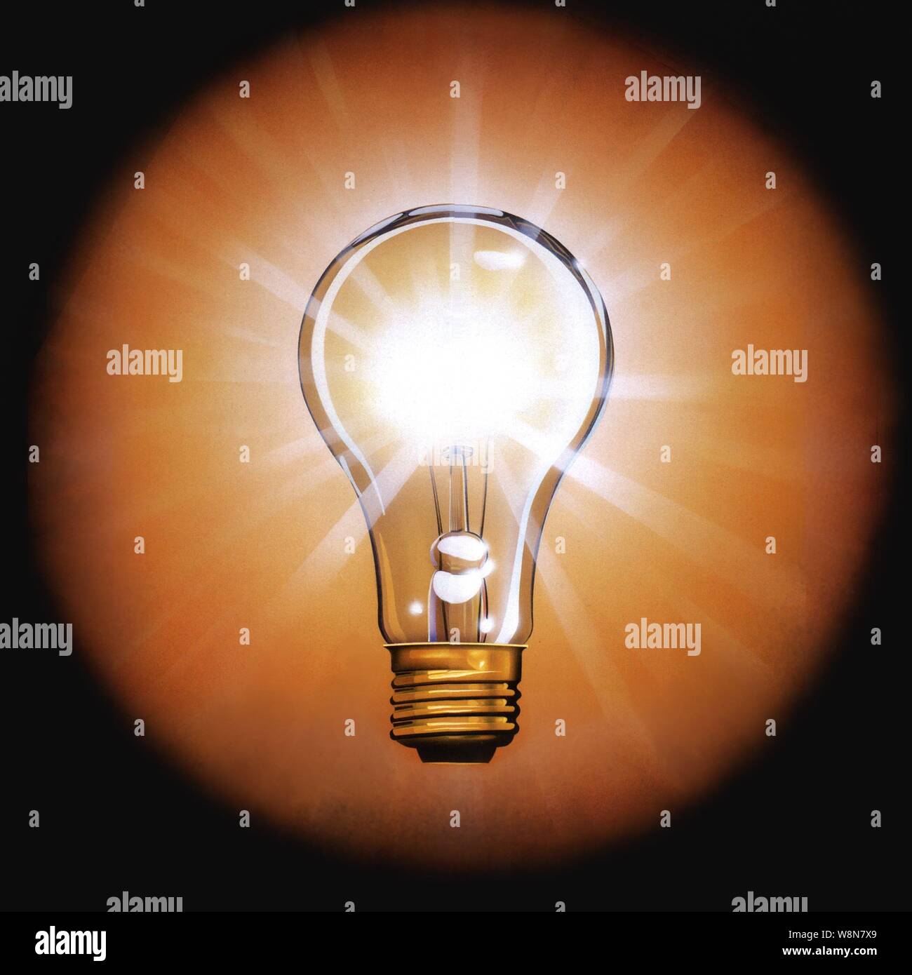 Lightbulb incandecent flairing light out into darkness Stock Photo - Alamy