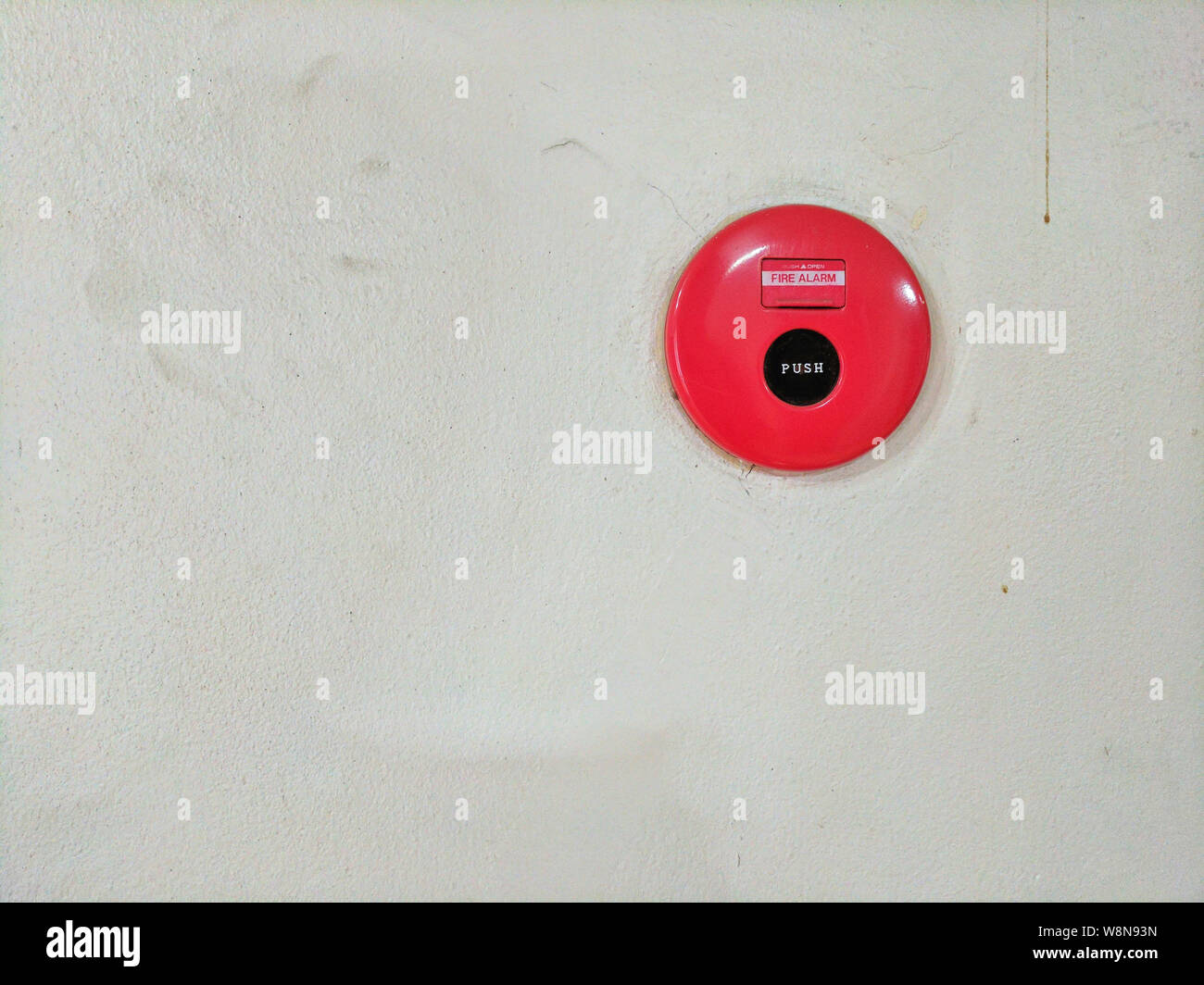 Old fire alarm button on old wall Stock Photo - Alamy