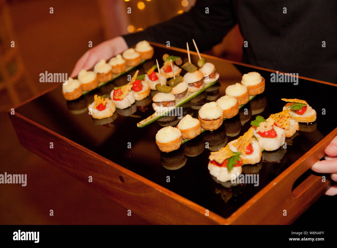 Waitress serving canapes hi-res stock photography and images - Alamy